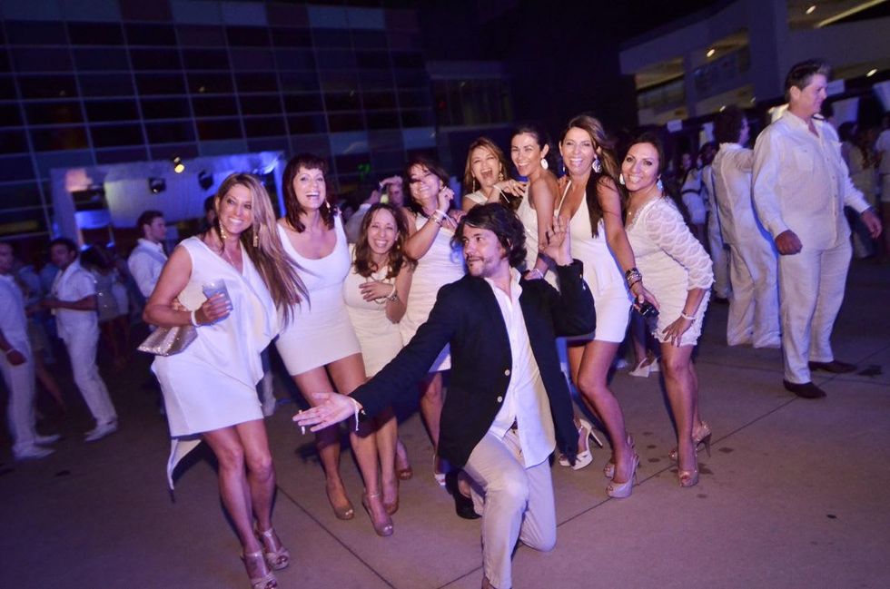 Social staple The White Party draws record crowds to dance the night ...