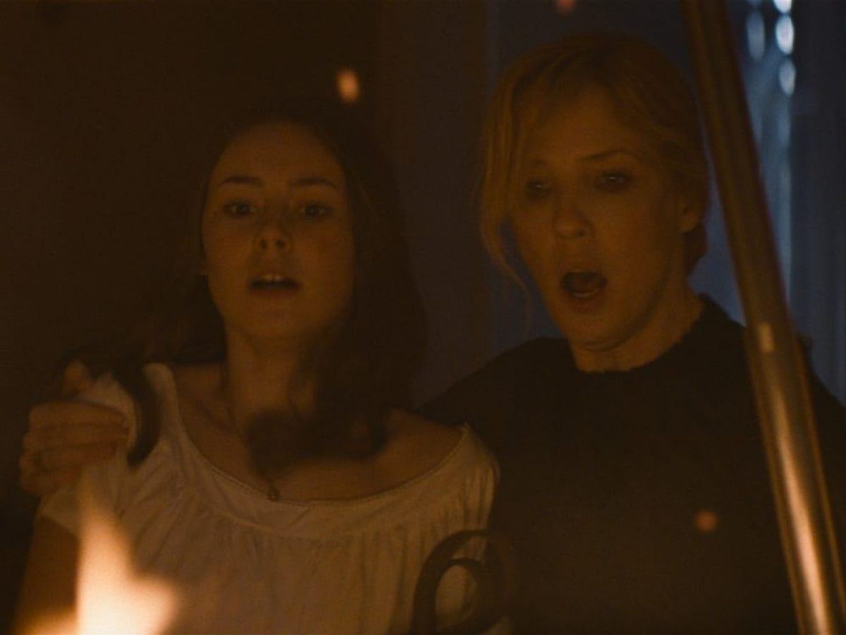 Amelia Crouch and Kelly Reilly in The Cursed. - CultureMap Austin