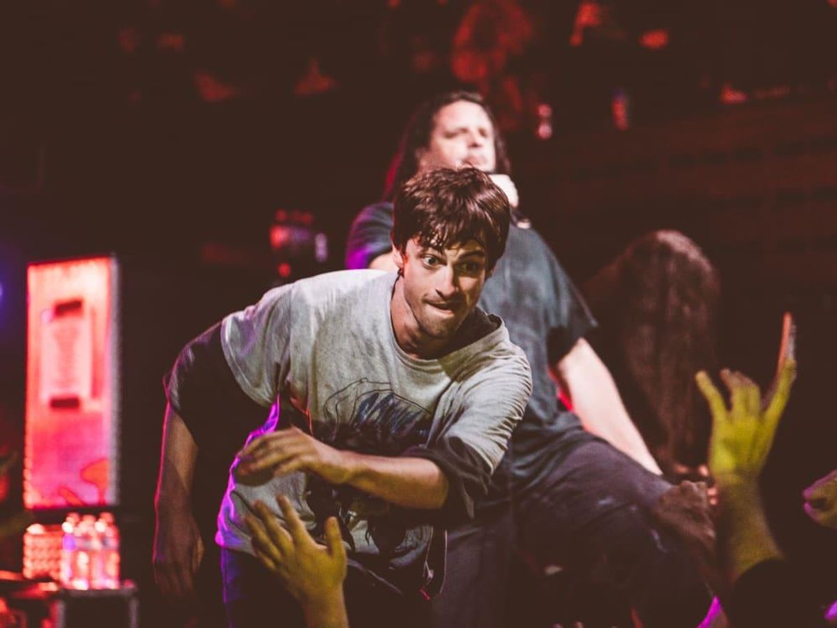 A stage diver at Cannibal Corpse. - CultureMap Austin