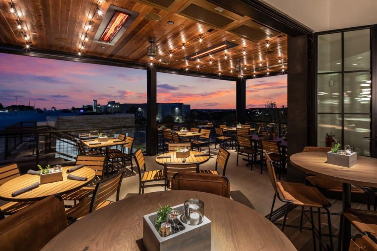 The patio sparkles at sunset. - CultureMap Austin