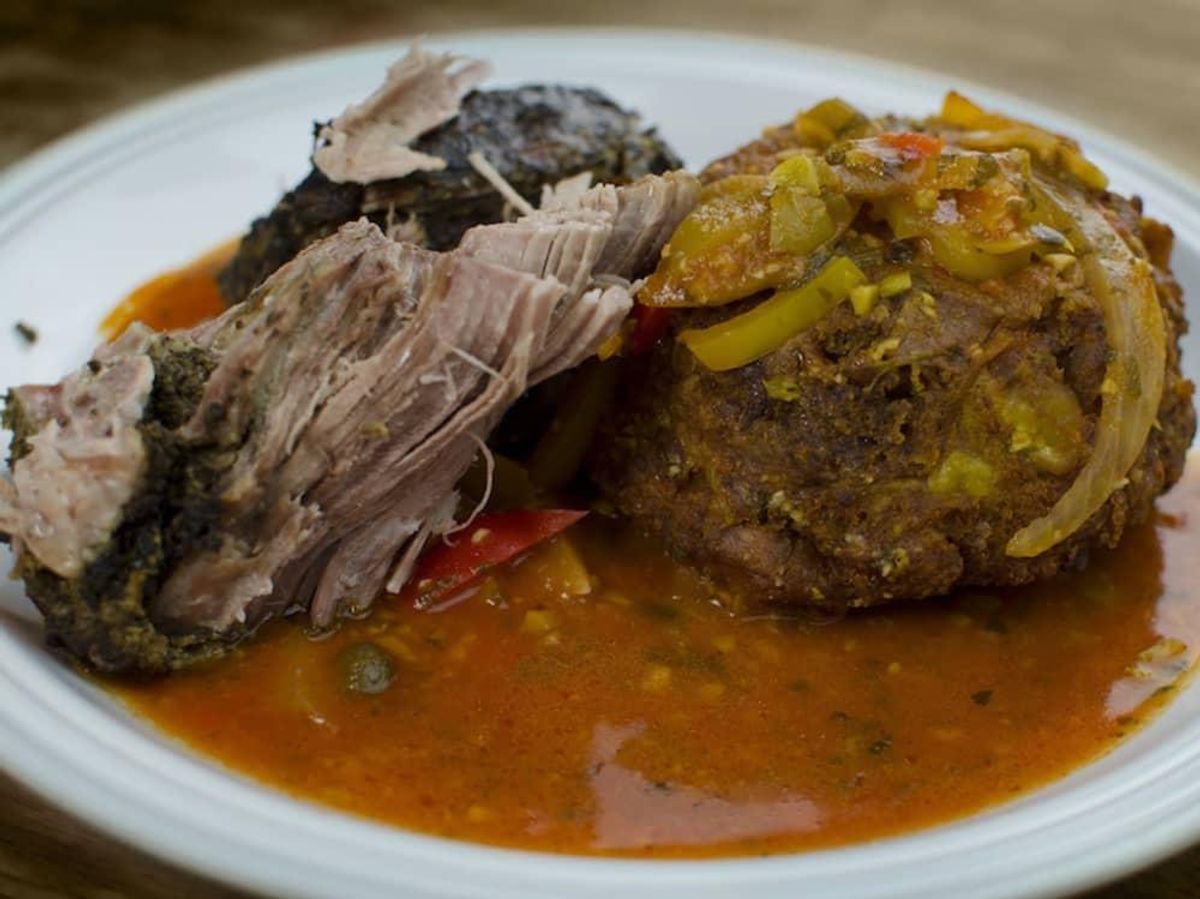 Pernil asado (shredded pork) is a specialty of Chago's. - CultureMap Austin