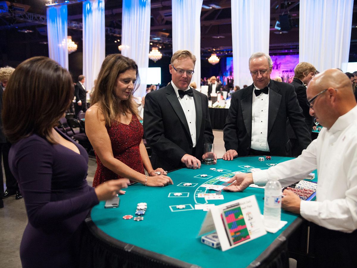 Jewel Ball revelers enjoy casino games after dinner. - CultureMap Austin