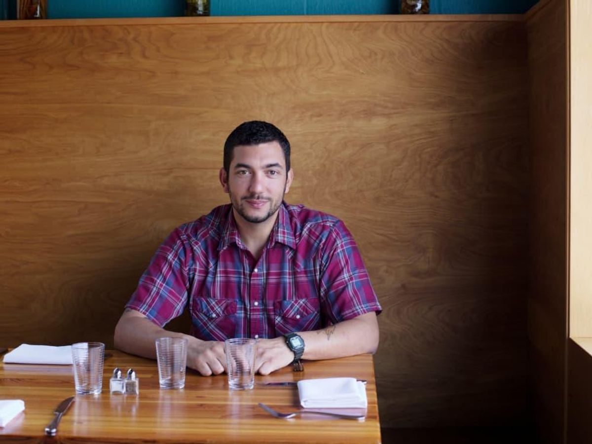 Ned Elliott, Foreign and Domestic Sit at the counter at Foreign and ...