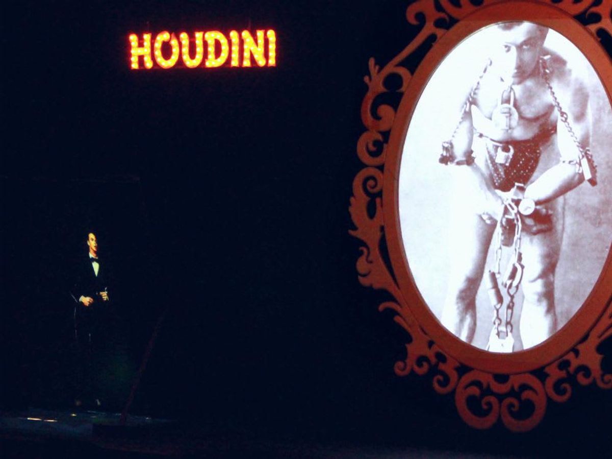 During the centennial announcement, a hologram of Harry Houdini gave ...