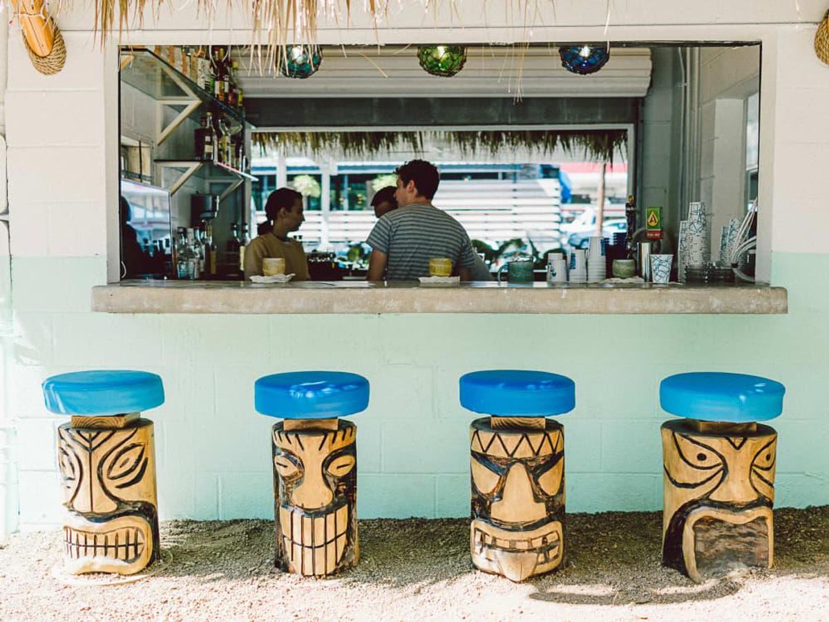 Order a classic rum cocktail from the tiki bar at Pool Burger ...