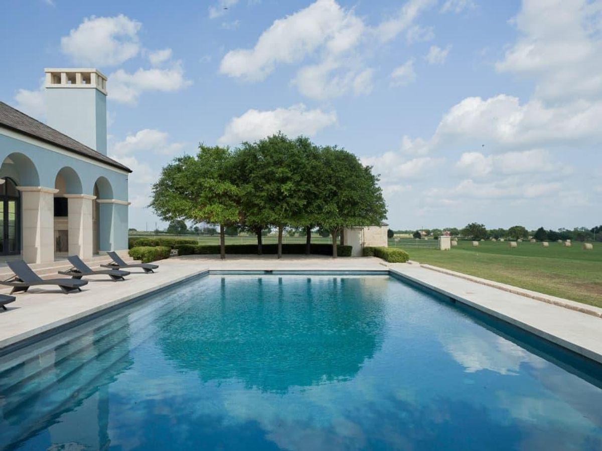 Cool off after a long day ranching at the pool or in the nearby river ...