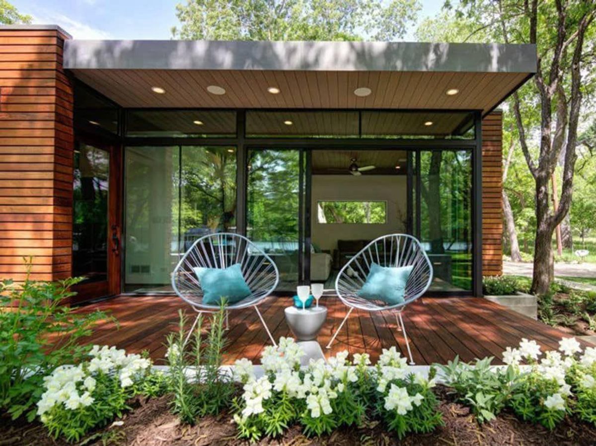 Rammed earth walls and rainscreen wall systems mixed with reclaimed ...